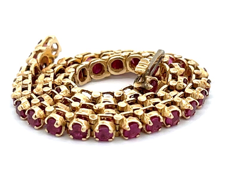 Round Red Ruby Tennis Bracelet in 14k Yellow Gold For Sale at 1stDibs