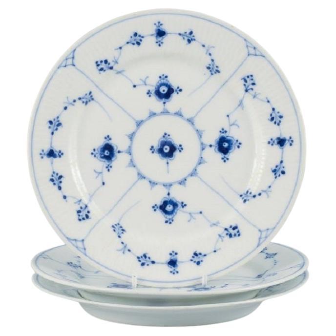 Royal Copenhagen, three Blue Fluted plain deep plates. Model number 1/ ...