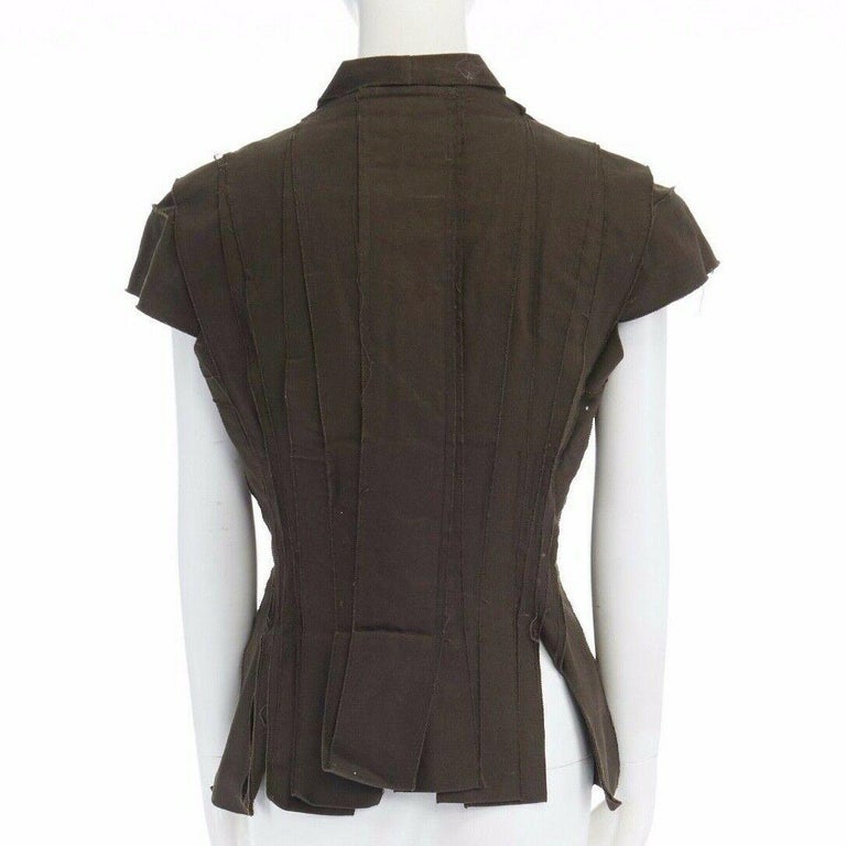 runway ISSEY MIYAKE AW2002 green deconstructed patched vest jacket top ...