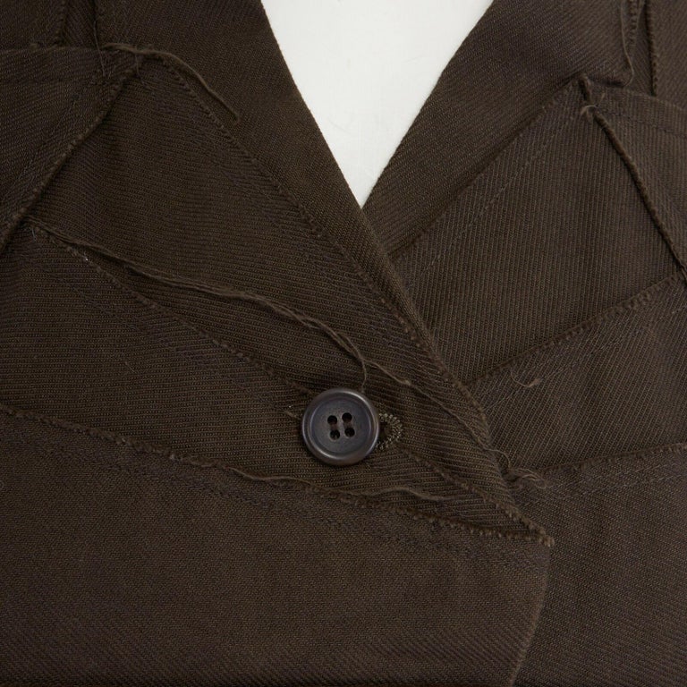 runway ISSEY MIYAKE AW2002 green deconstructed patched vest jacket top ...