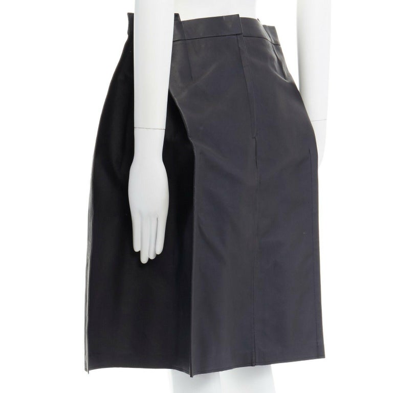 runway JUNYA WATANABE SS2015 2D flatpack black circle structured skirt ...