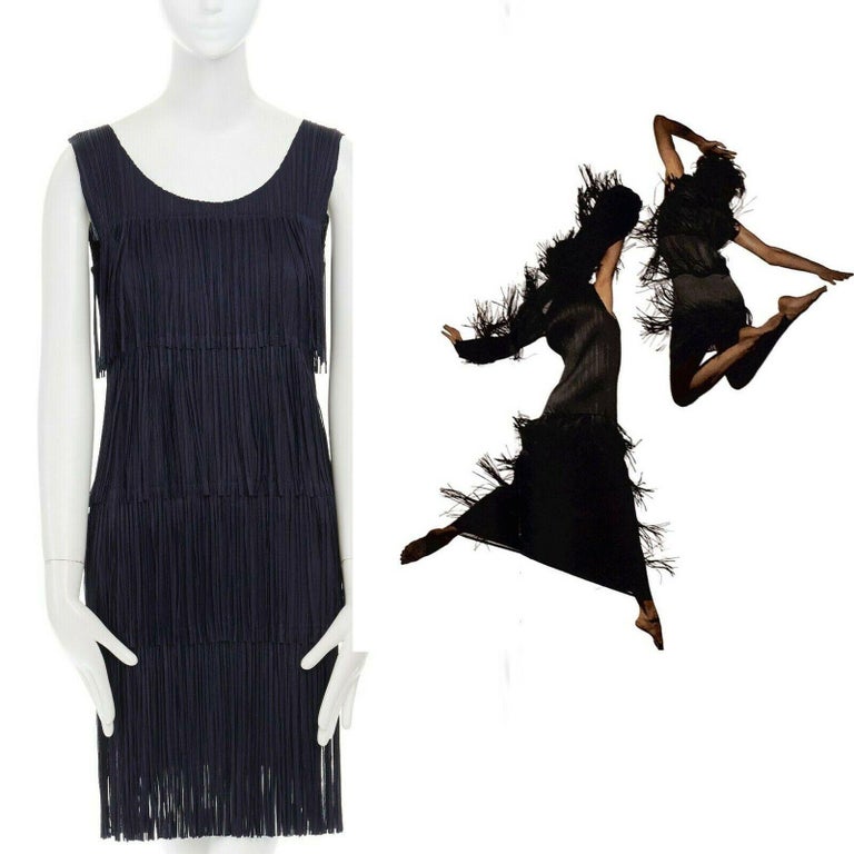 runway PLEATS PLEASE Issey Miyake navy pleated fringe tier flapper ...