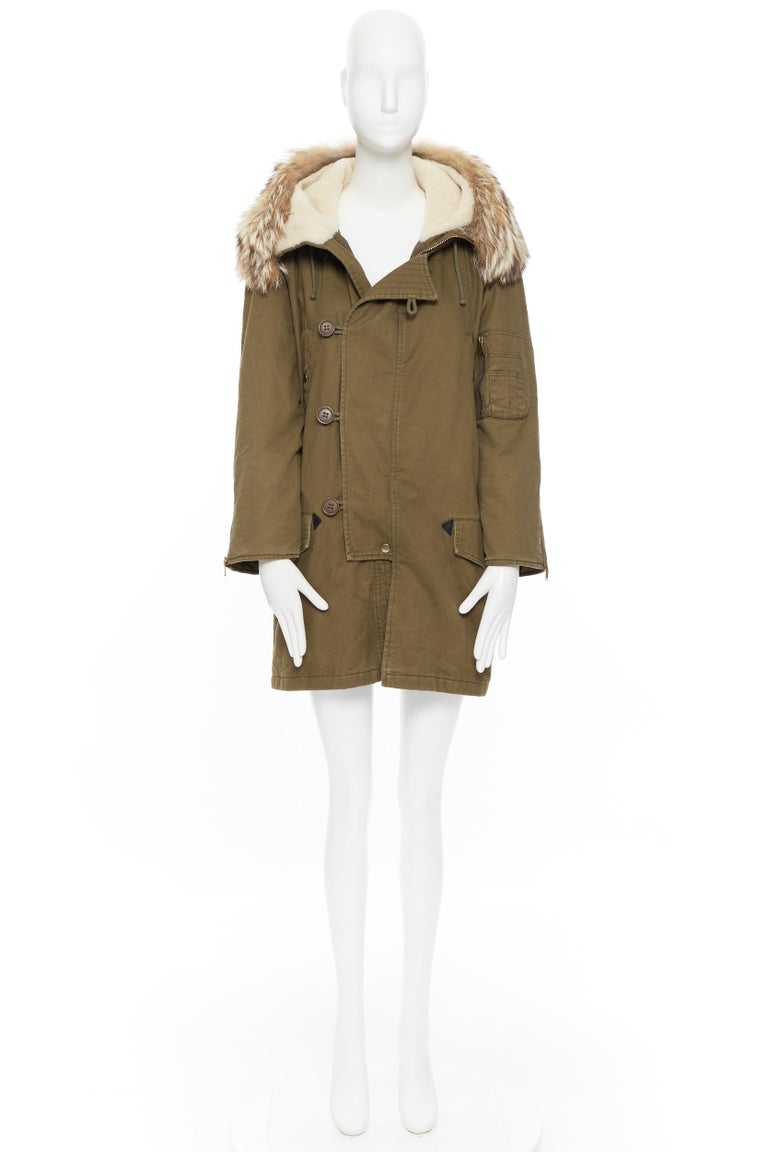 runway SAINT LAURENT AW14 coyote fur trimmed shearling hooded parka ...