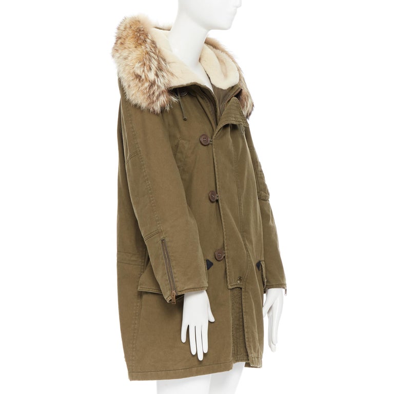 runway SAINT LAURENT AW14 coyote fur trimmed shearling hooded parka ...