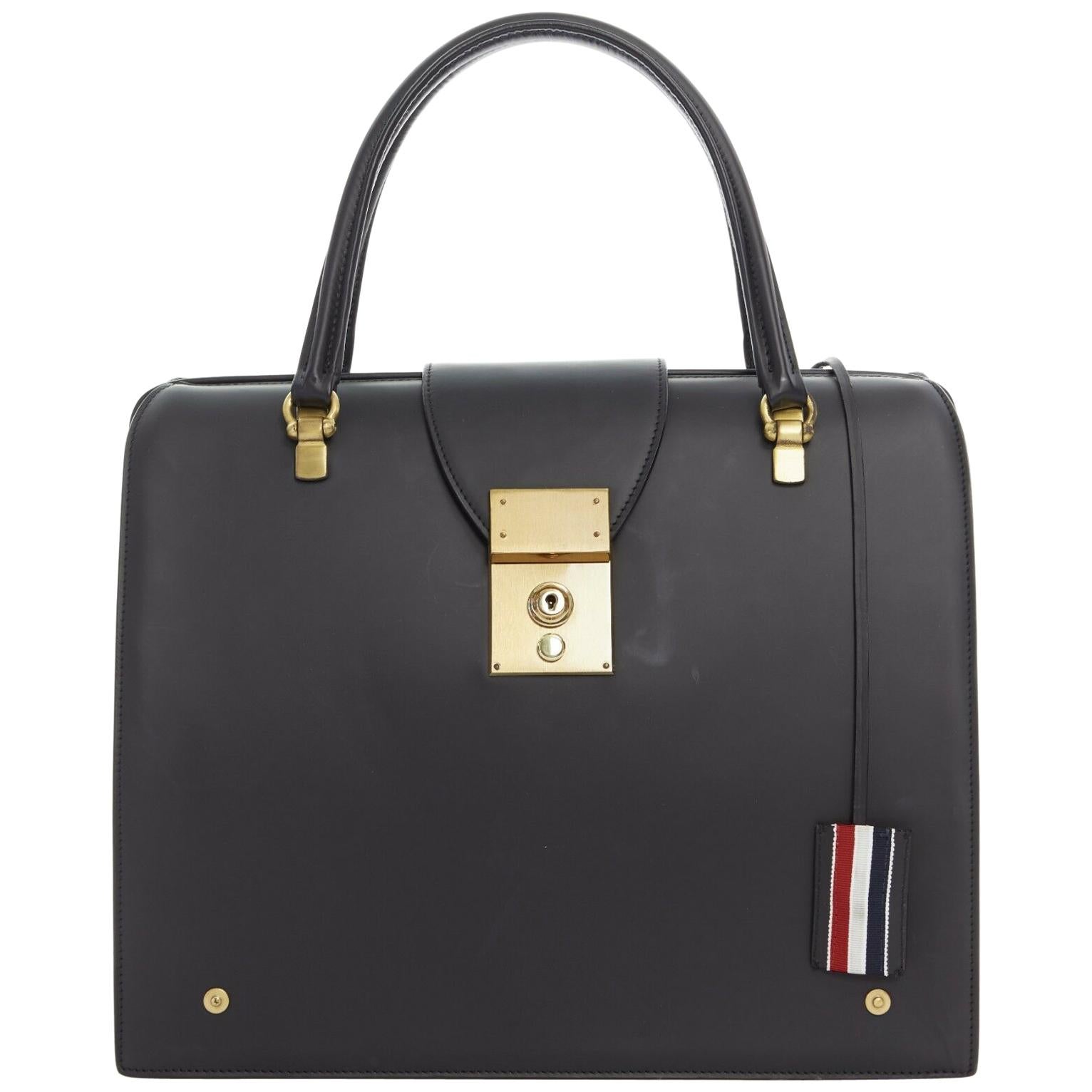 runway THOM BROWNE Mrs. Thom black leather gold clasp lock top handle ...