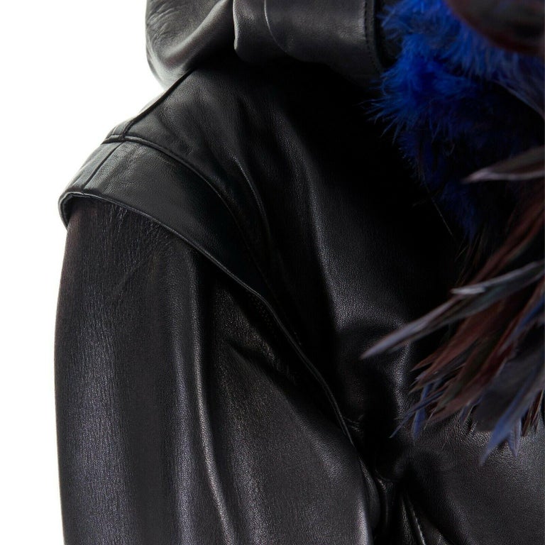 runway YOHJI YAMAMOTO 1991 black padded leather oversized feather hood ...