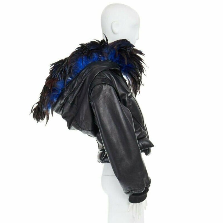 runway YOHJI YAMAMOTO 1991 black padded leather oversized feather hood ...