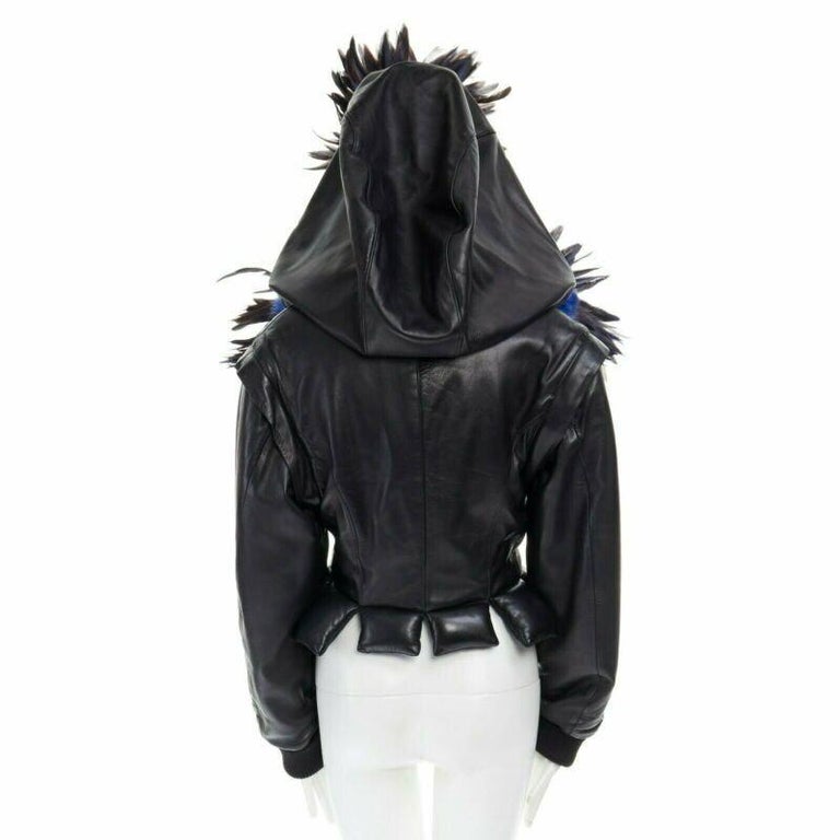 runway YOHJI YAMAMOTO 1991 black padded leather oversized feather hood ...