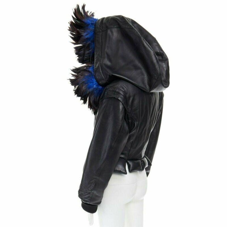 runway YOHJI YAMAMOTO 1991 black padded leather oversized feather hood ...