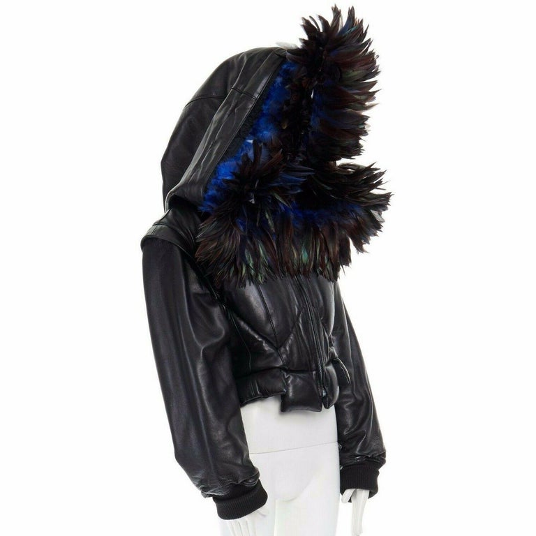 runway YOHJI YAMAMOTO AW05 black padded leather oversized feather hood ...