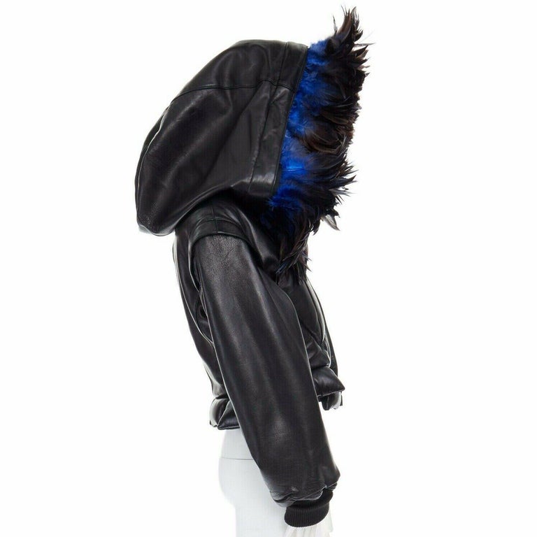 runway YOHJI YAMAMOTO AW05 black padded leather oversized feather hood ...