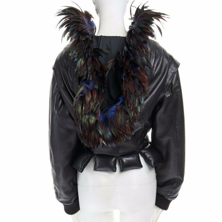 runway YOHJI YAMAMOTO AW05 black padded leather oversized feather hood ...