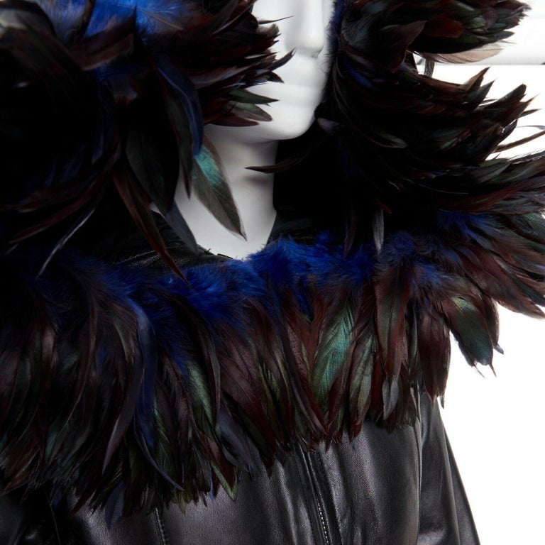 runway YOHJI YAMAMOTO AW05 black padded leather oversized feather hood ...