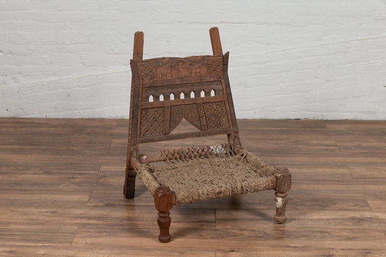 Rustic Indian Low Wooden Chair with Rope Seat and Weathered Appearance ...
