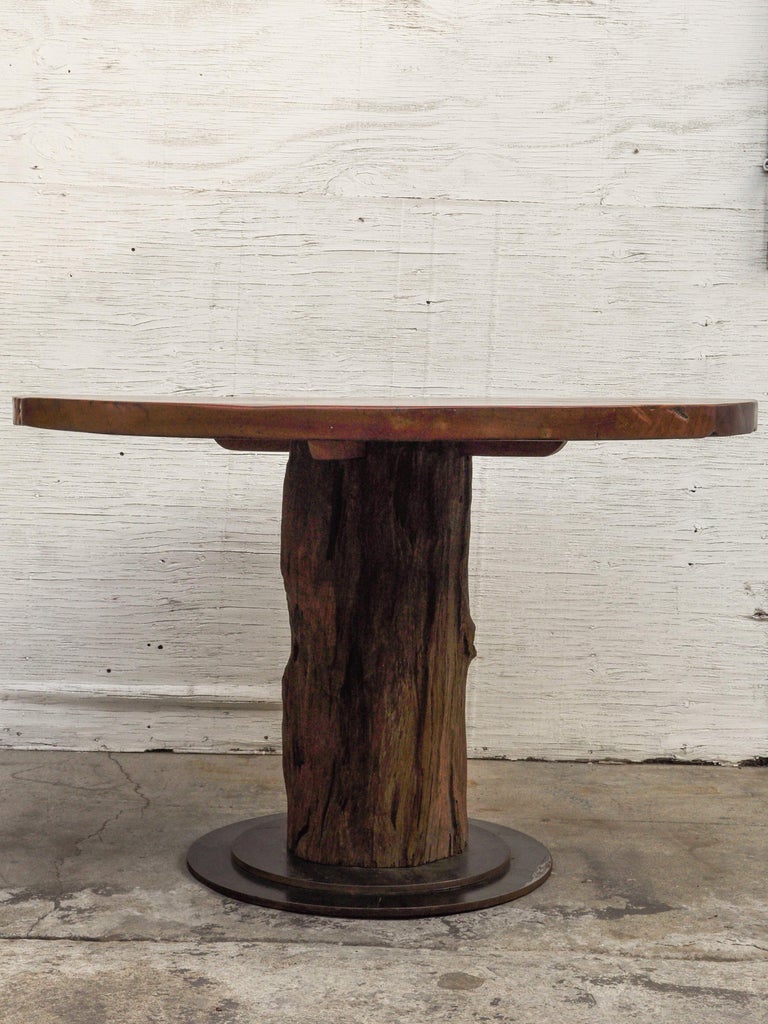 Rustic Round Table Recycled Bridge Wood with Tiered Steel Plate Base at ...