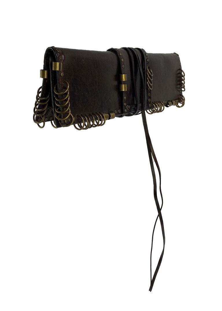 S/S 2002 Yves Saint Laurent by Tom Ford Pierced Leather Safari Clutch ...