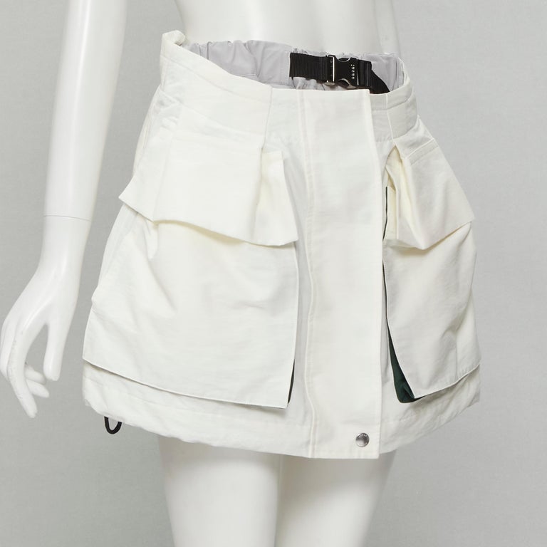 SACAI 2021 silver nylon white pleated flap pocket layered skort shorts ...