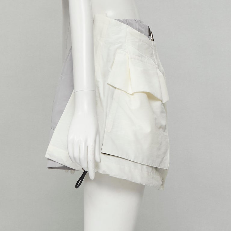 SACAI 2021 silver nylon white pleated flap pocket layered skort shorts ...