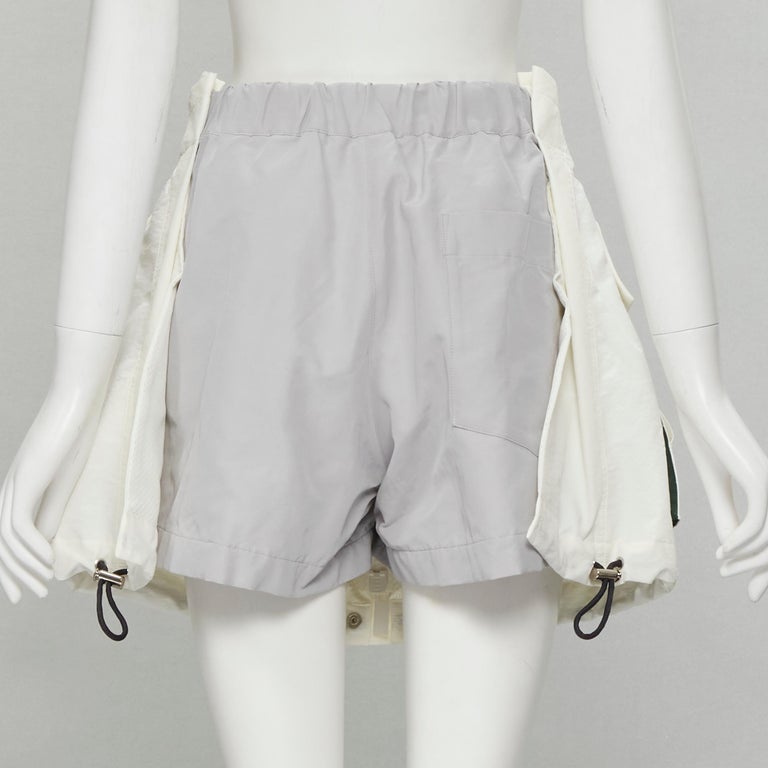 SACAI 2021 silver nylon white pleated flap pocket layered skort shorts ...