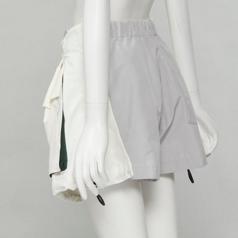 SACAI 2021 silver nylon white pleated flap pocket layered skort shorts ...