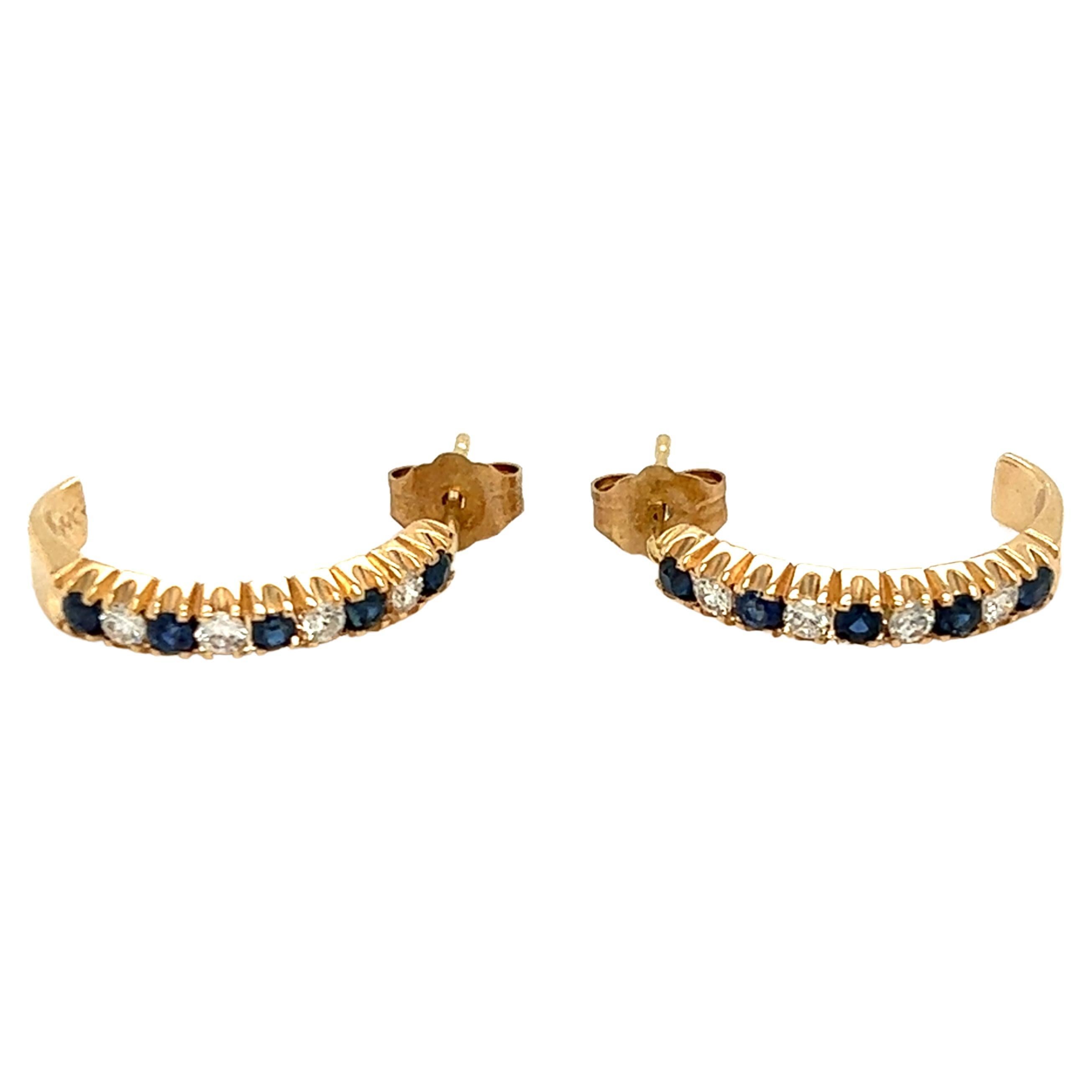 Oval Cut Sapphire Half-Hoop Twist Earrings in 18 Karat Yellow and White ...