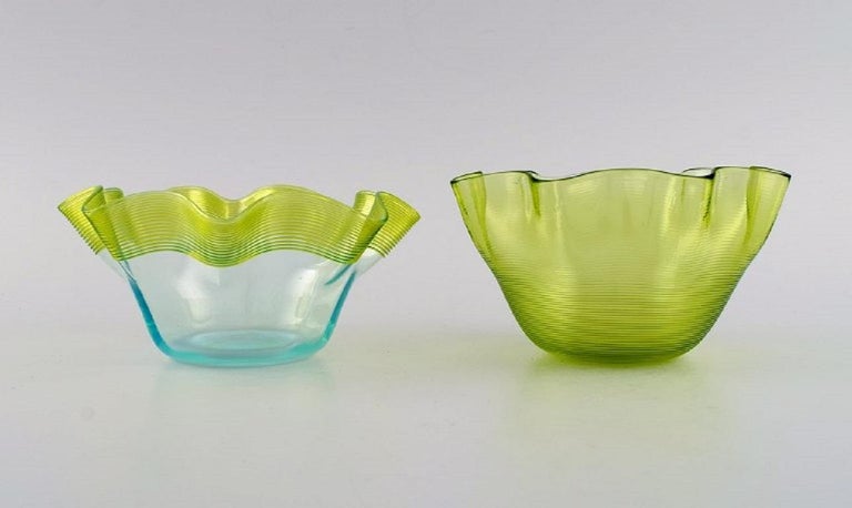 Scandinavian glass artist. Plate and two bowls in mouth-blown art glass ...