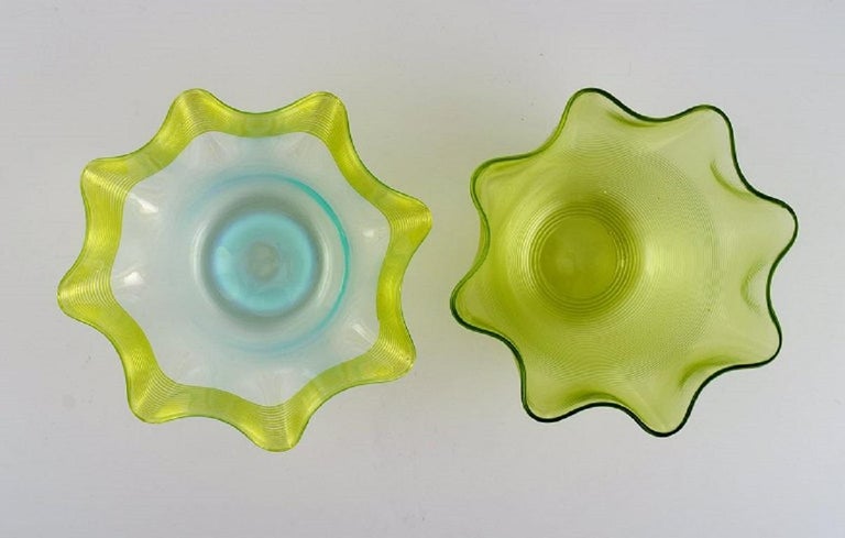 Scandinavian glass artist. Plate and two bowls in mouth-blown art glass ...