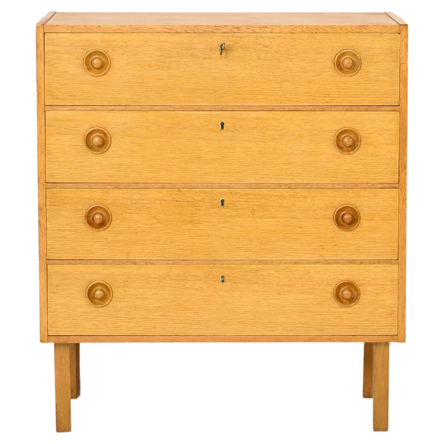 A Gordon Russell Oak Chest of drawers. at 1stDibs