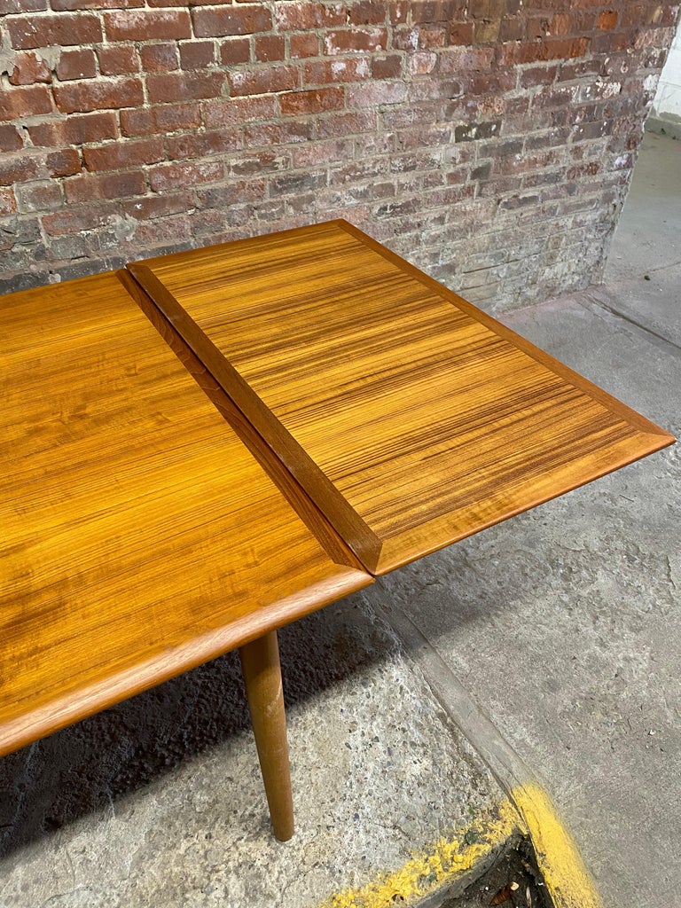 Scandinavian Rectangular Teak Draw Leaf Dining Table For Sale at 1stDibs