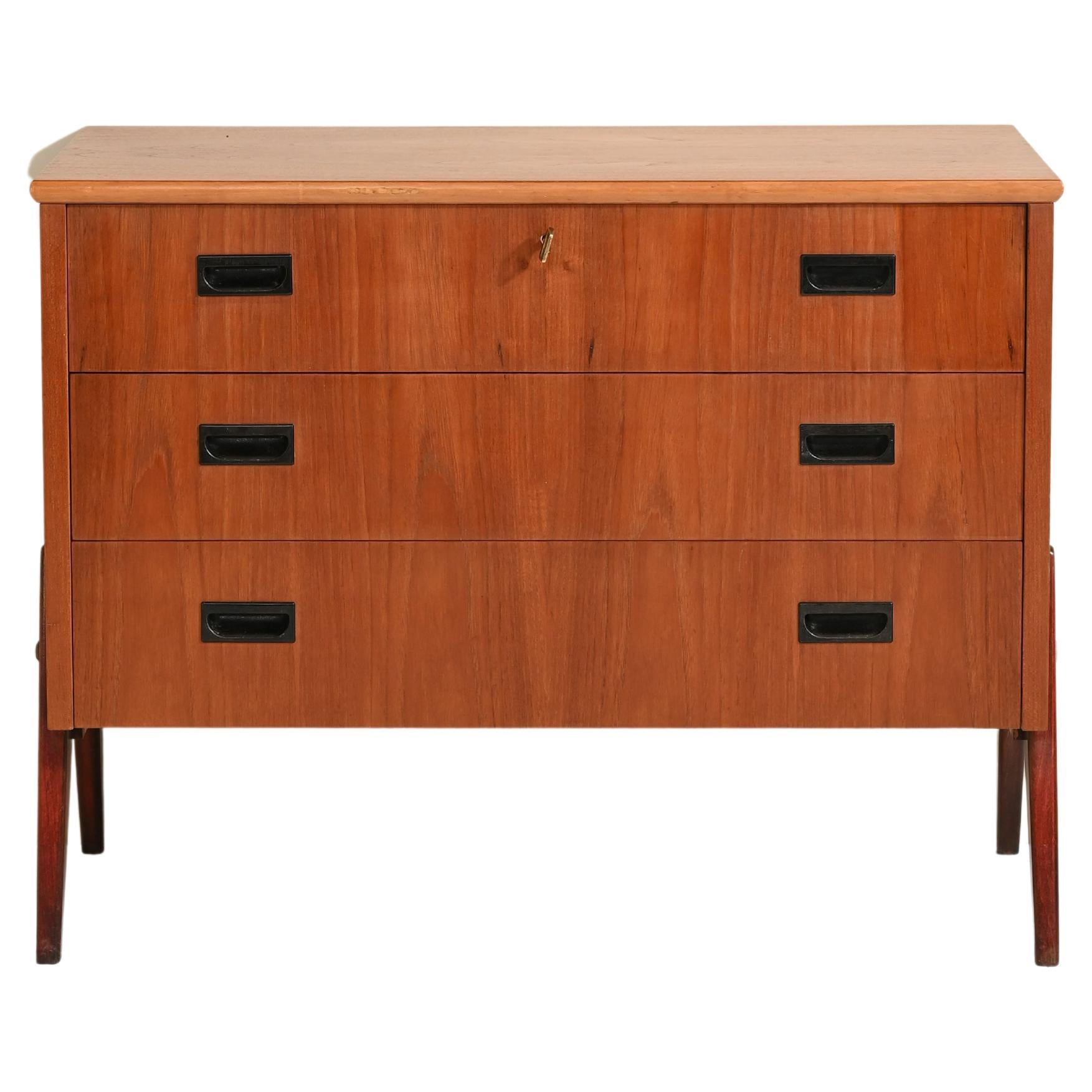 Teak Chest of Drawers with Black Painted Details For Sale at 1stDibs