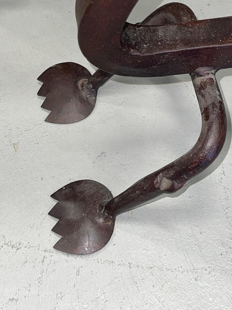 Fers à repasser sculptés en fer forgé avec dragons sur 1stDibs