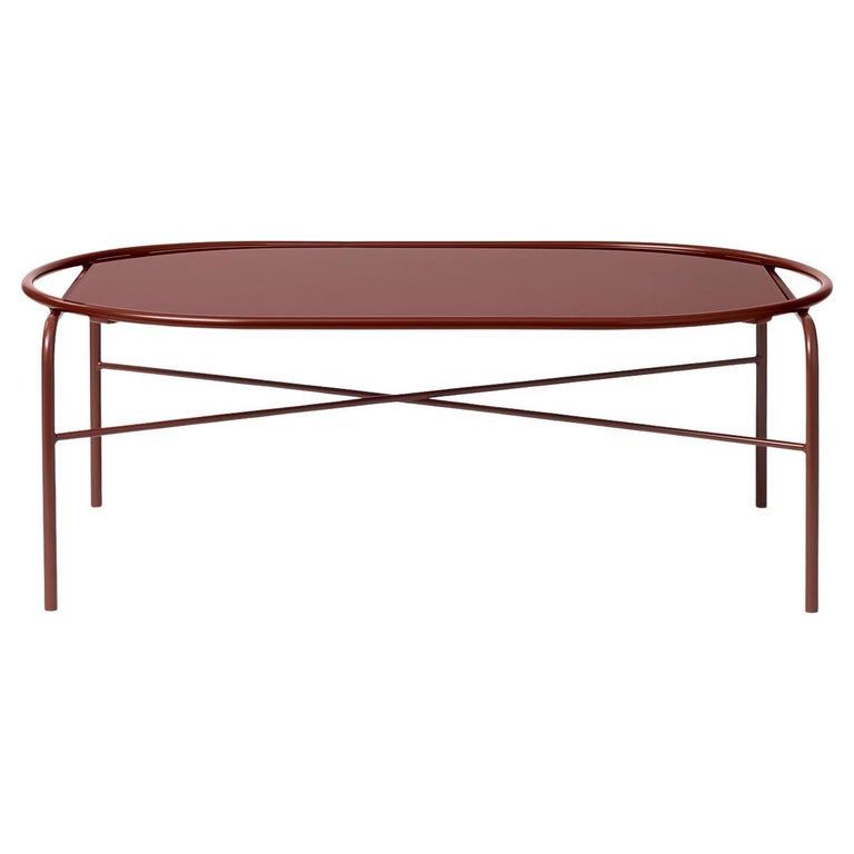 Table ovale Secant en verre rougeâtre et rouge oxyde de Warm Nordic ...