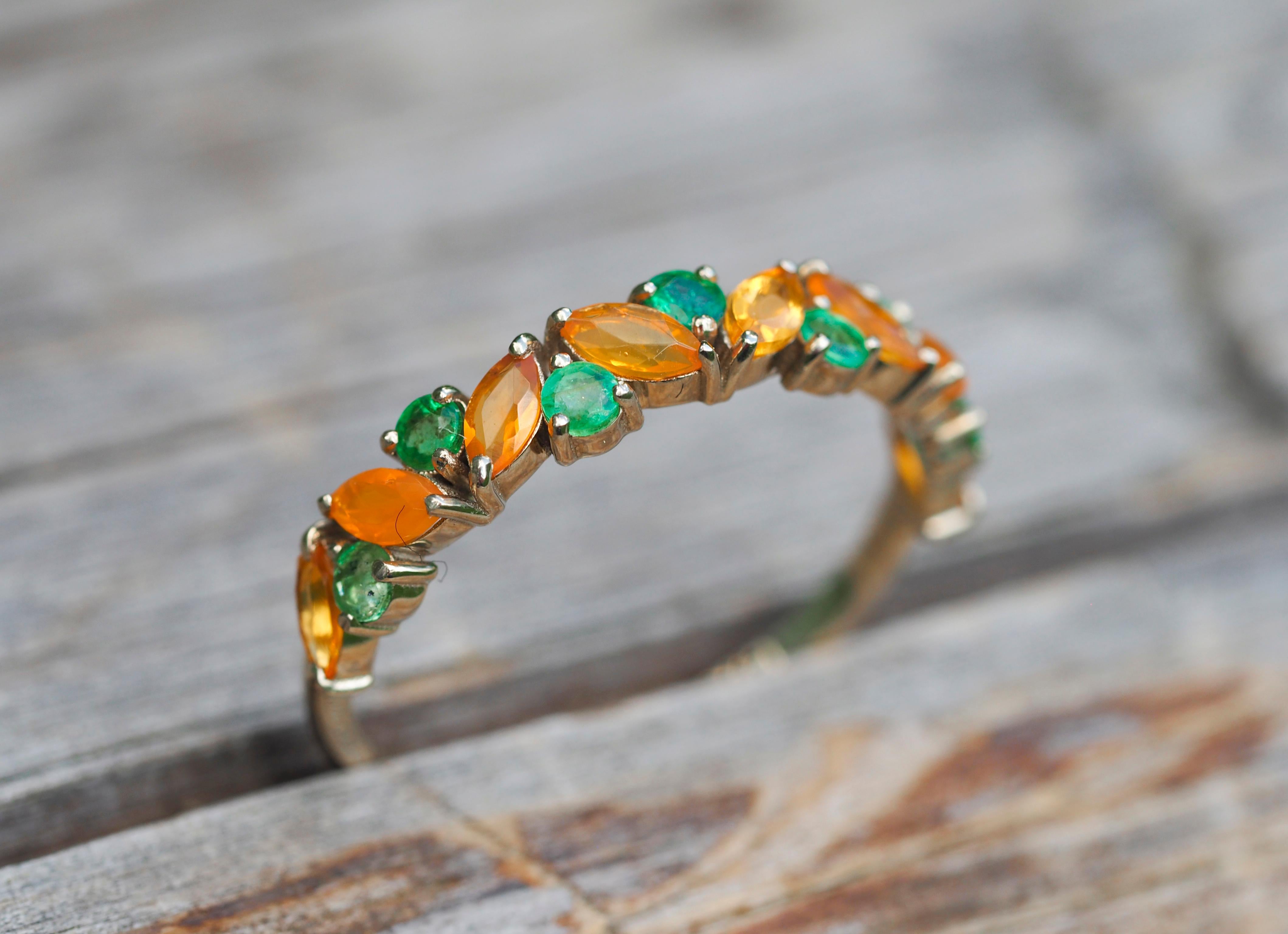 Semi eternity gold ring with opals, emeralds. For Sale at 1stDibs