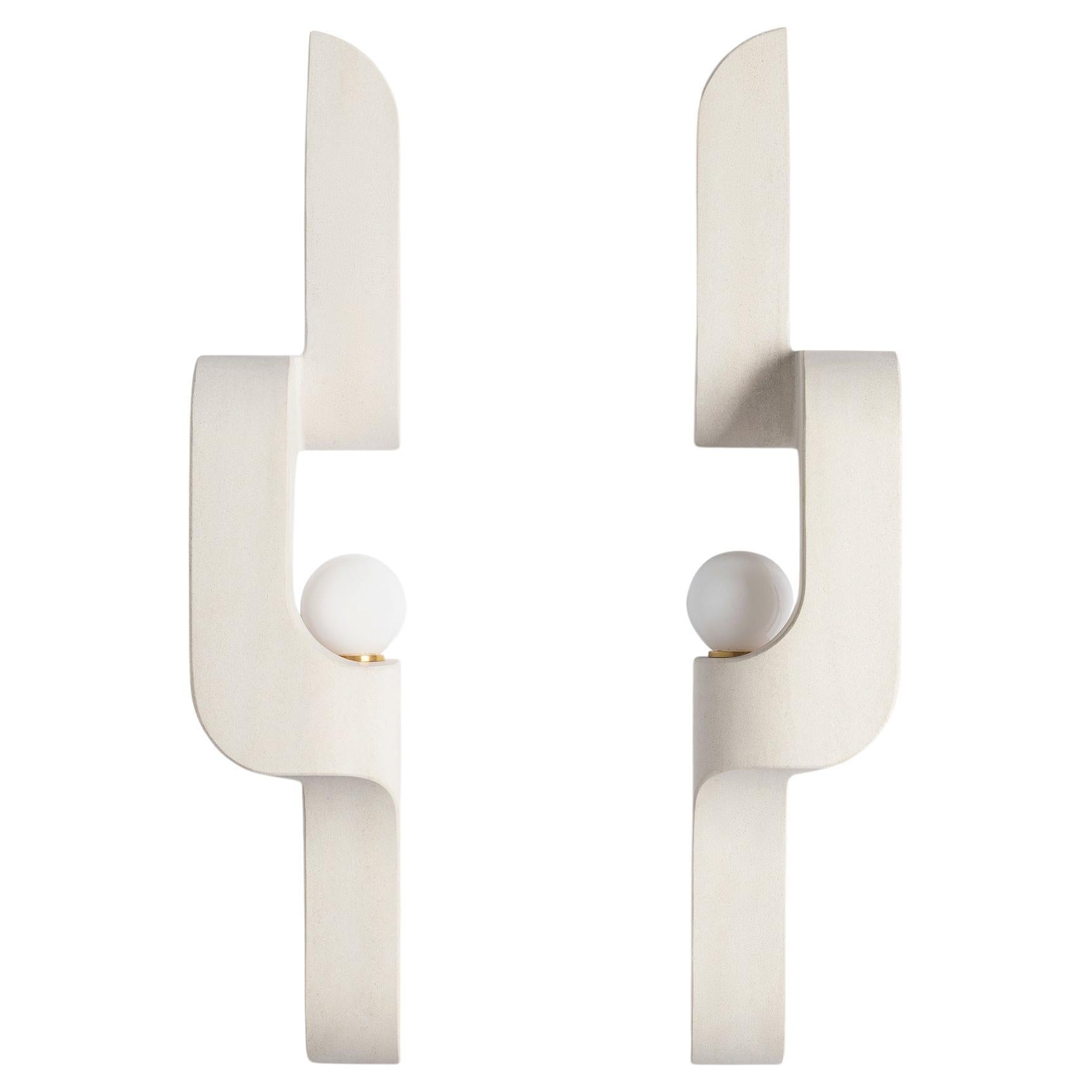 Serpentine Vertical Stone Wall Sconce - Mirrored pair For Sale at 1stDibs