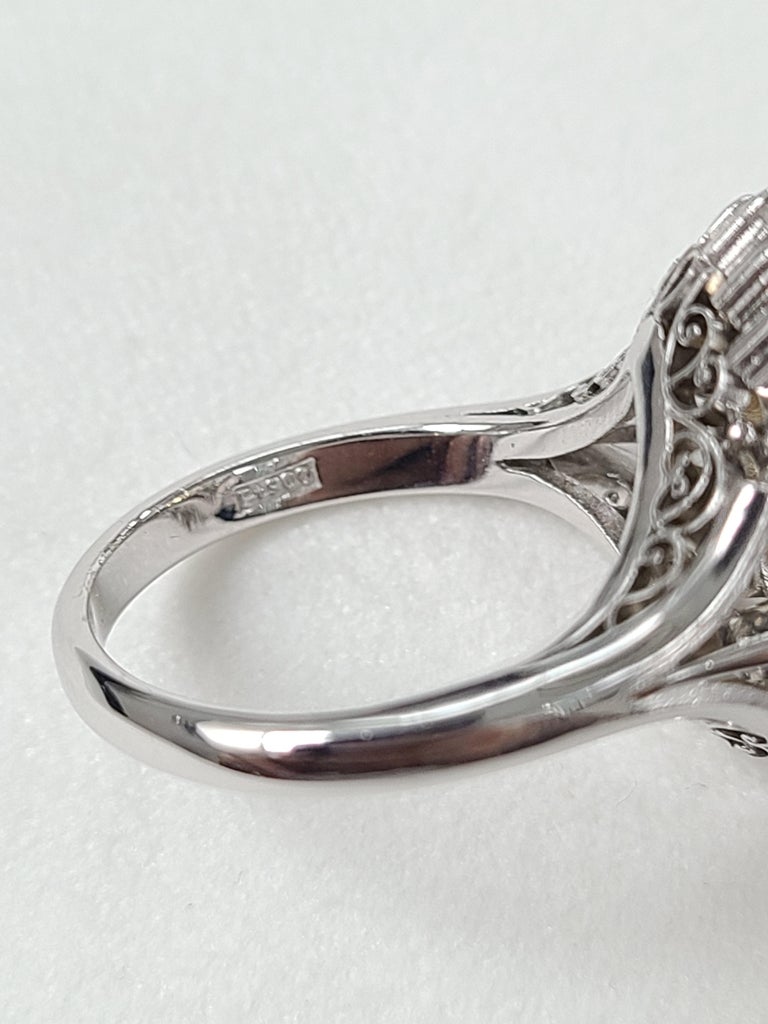 Platinum PT900 Orange Sapphire Ring with Diamonds For Sale at 1stDibs