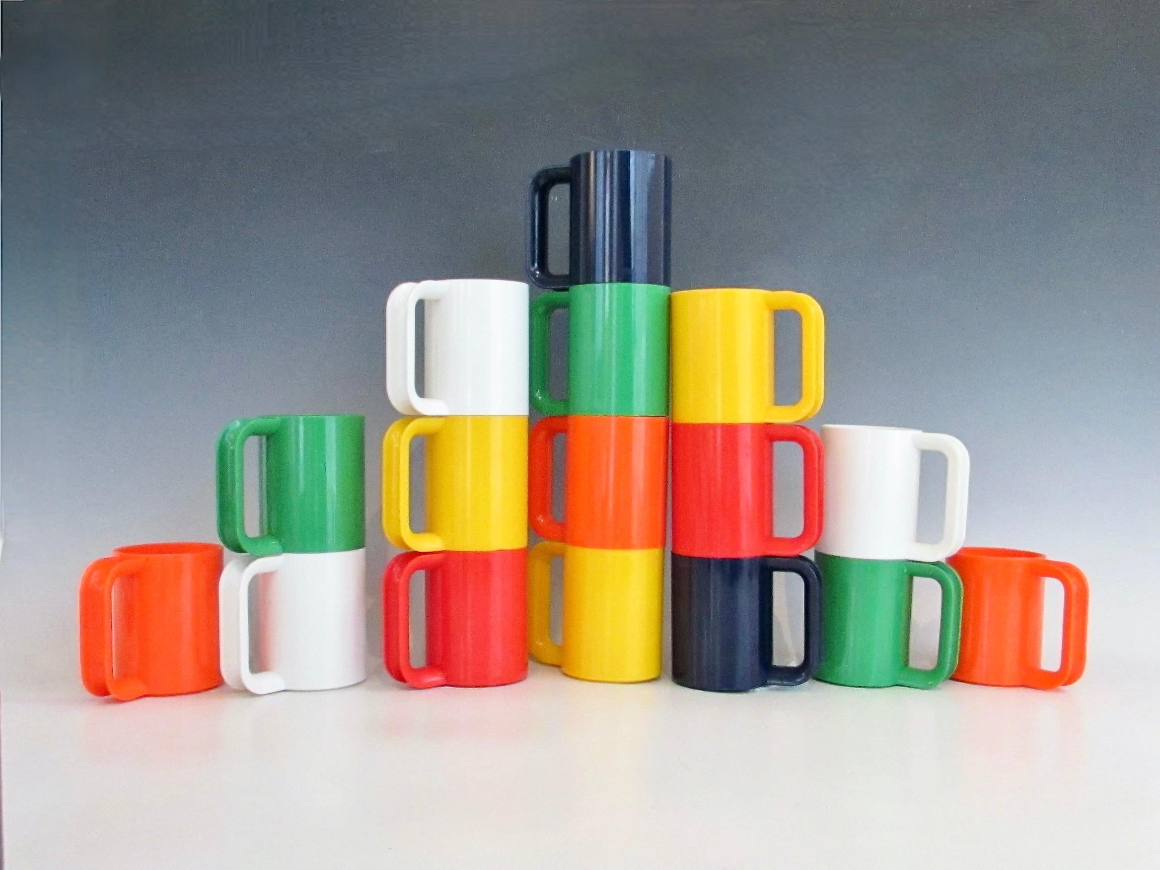 Set of 16 Massimo Vignelli designed stack cups in green red orange ...