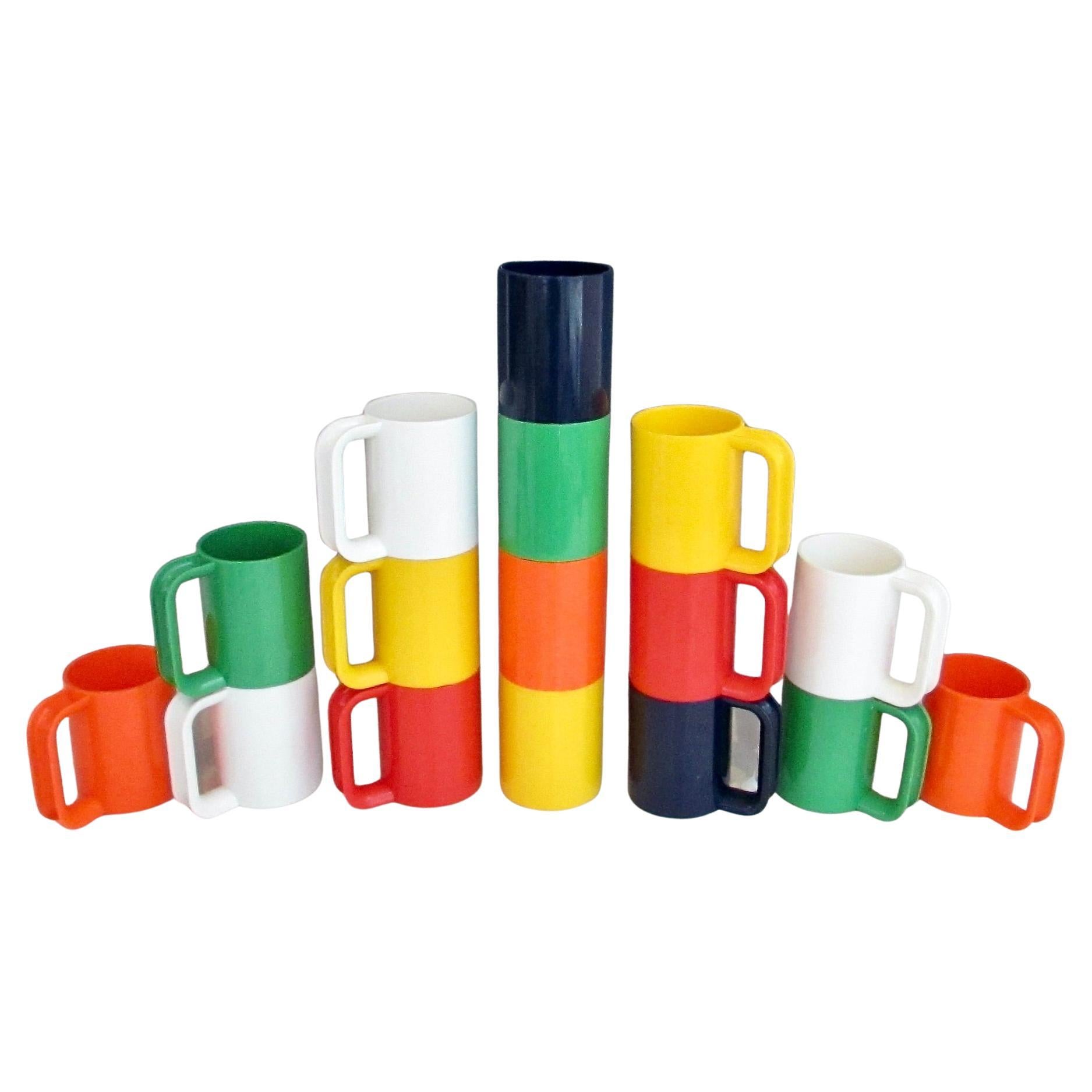 Set of 16 Massimo Vignelli designed stack cups in green red orange ...