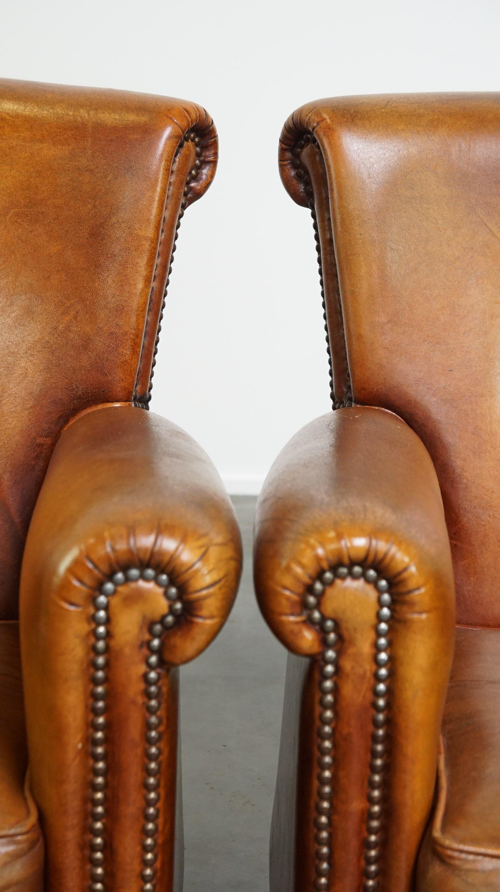 Set of 2 beautiful and comfortable sheep leather armchairs with a ...