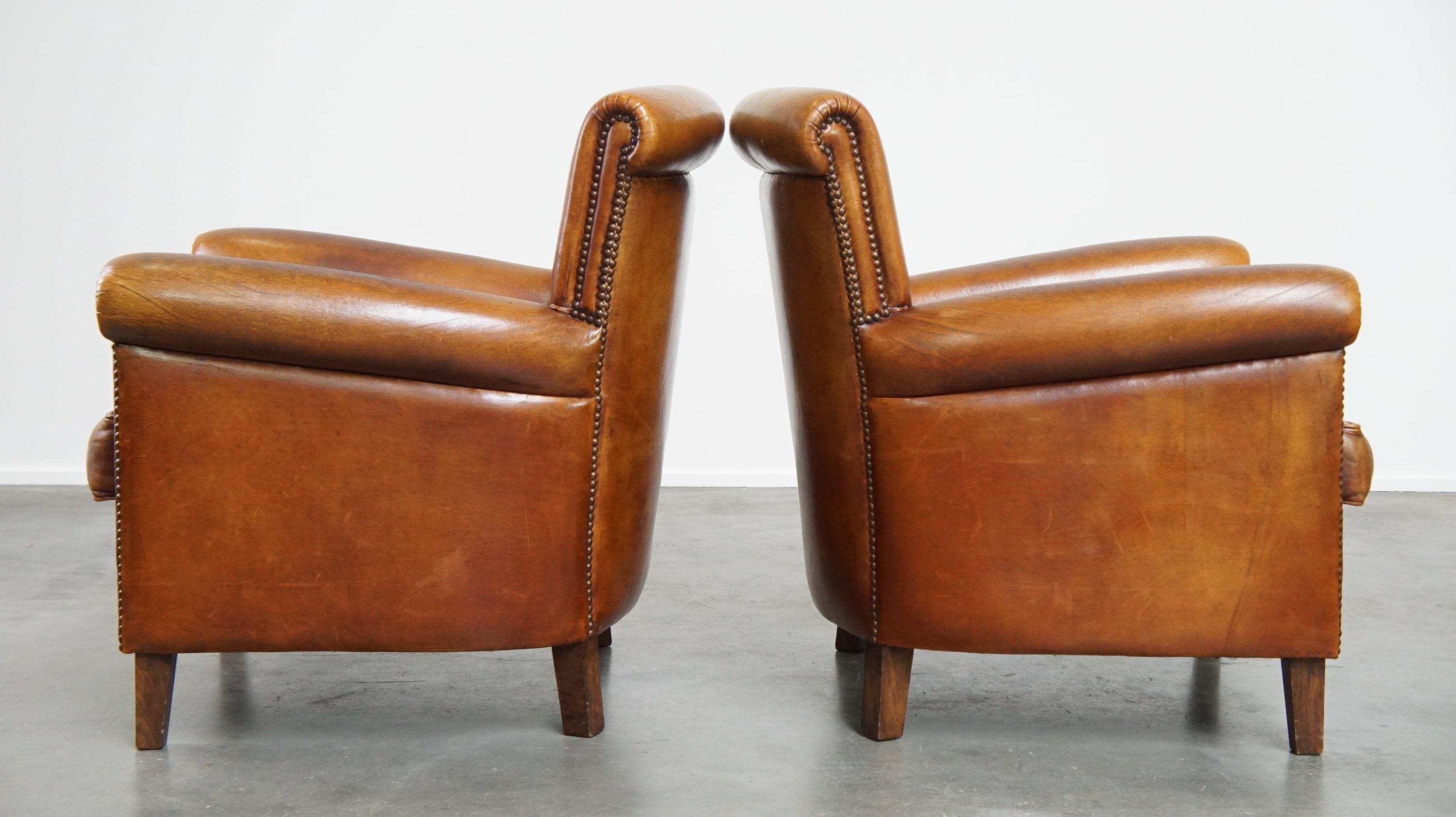 Set of 2 beautiful and comfortable sheep leather armchairs with a ...