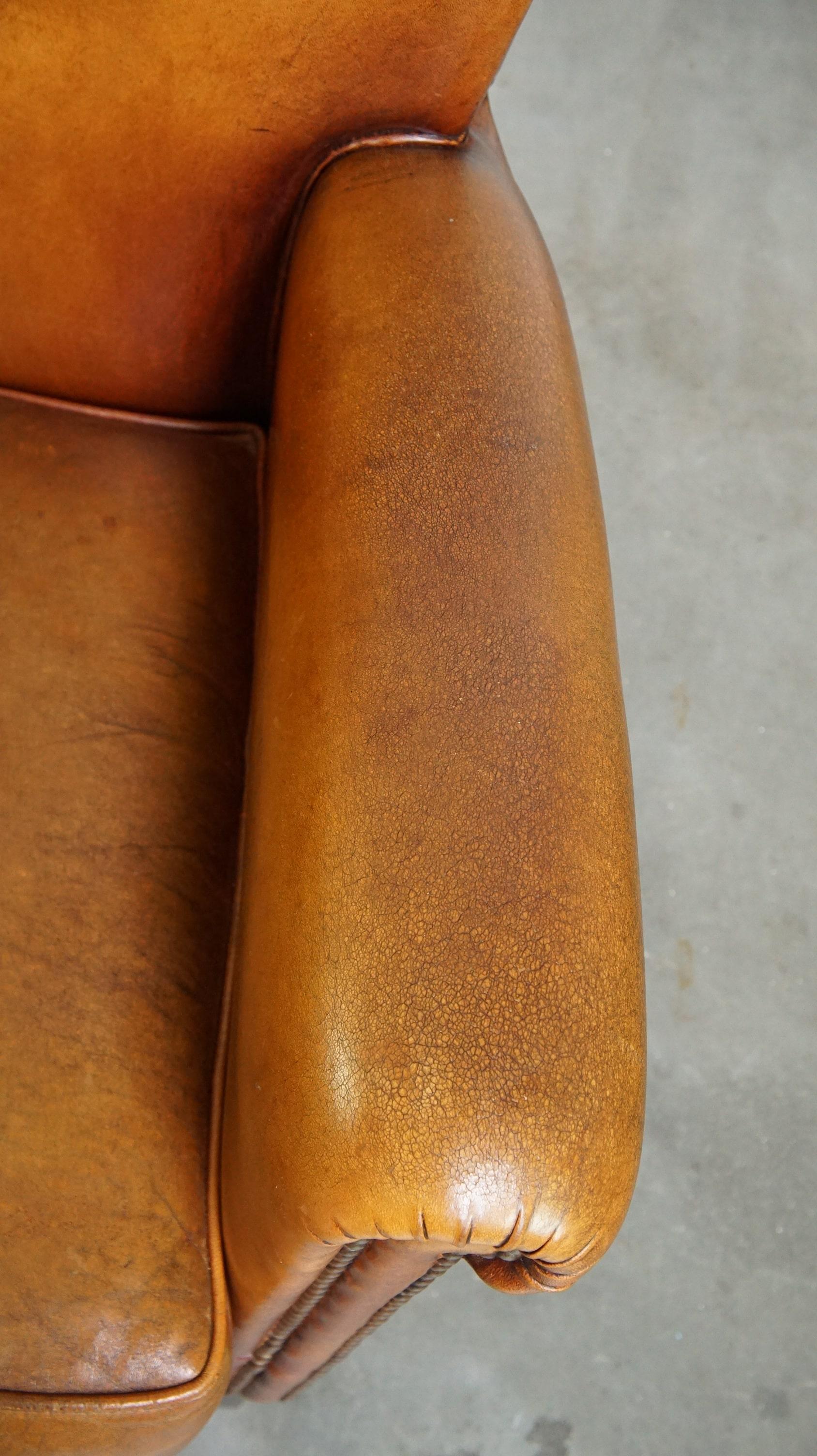 Set of 2 beautiful and comfortable sheep leather armchairs with a ...