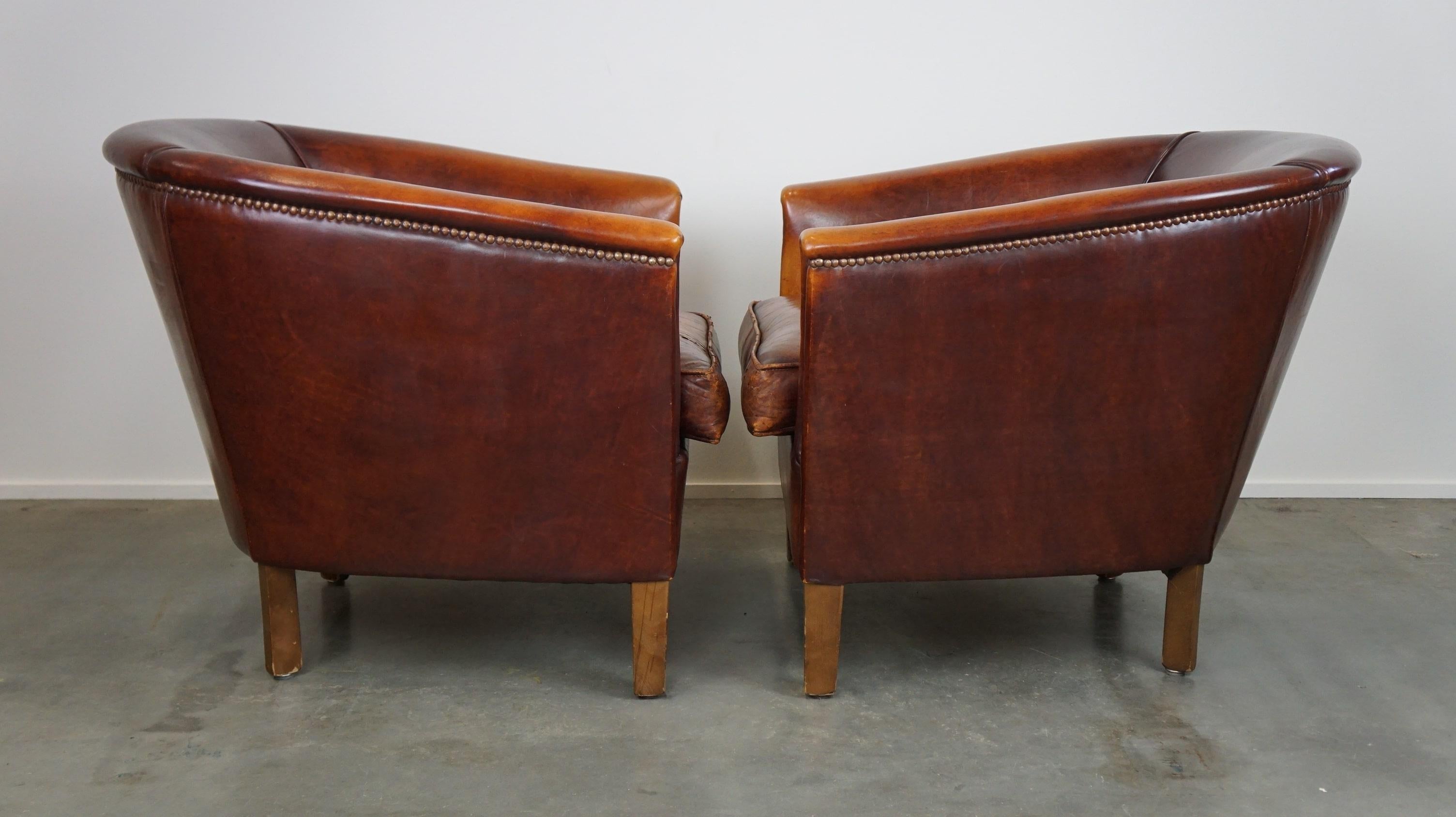 Set of 2 sleek, subtle sheep leather design club chairs with great ...