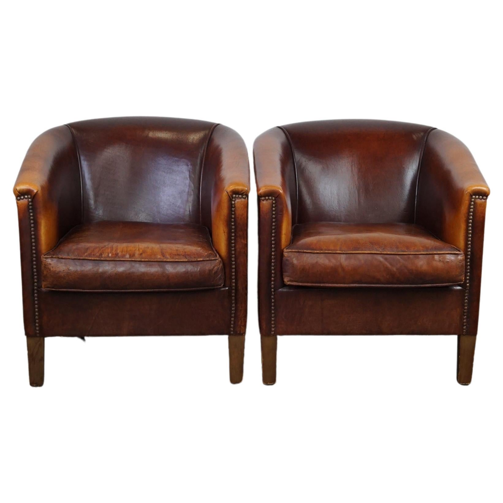 Set of 2 sleek, subtle sheep leather design club chairs with great ...