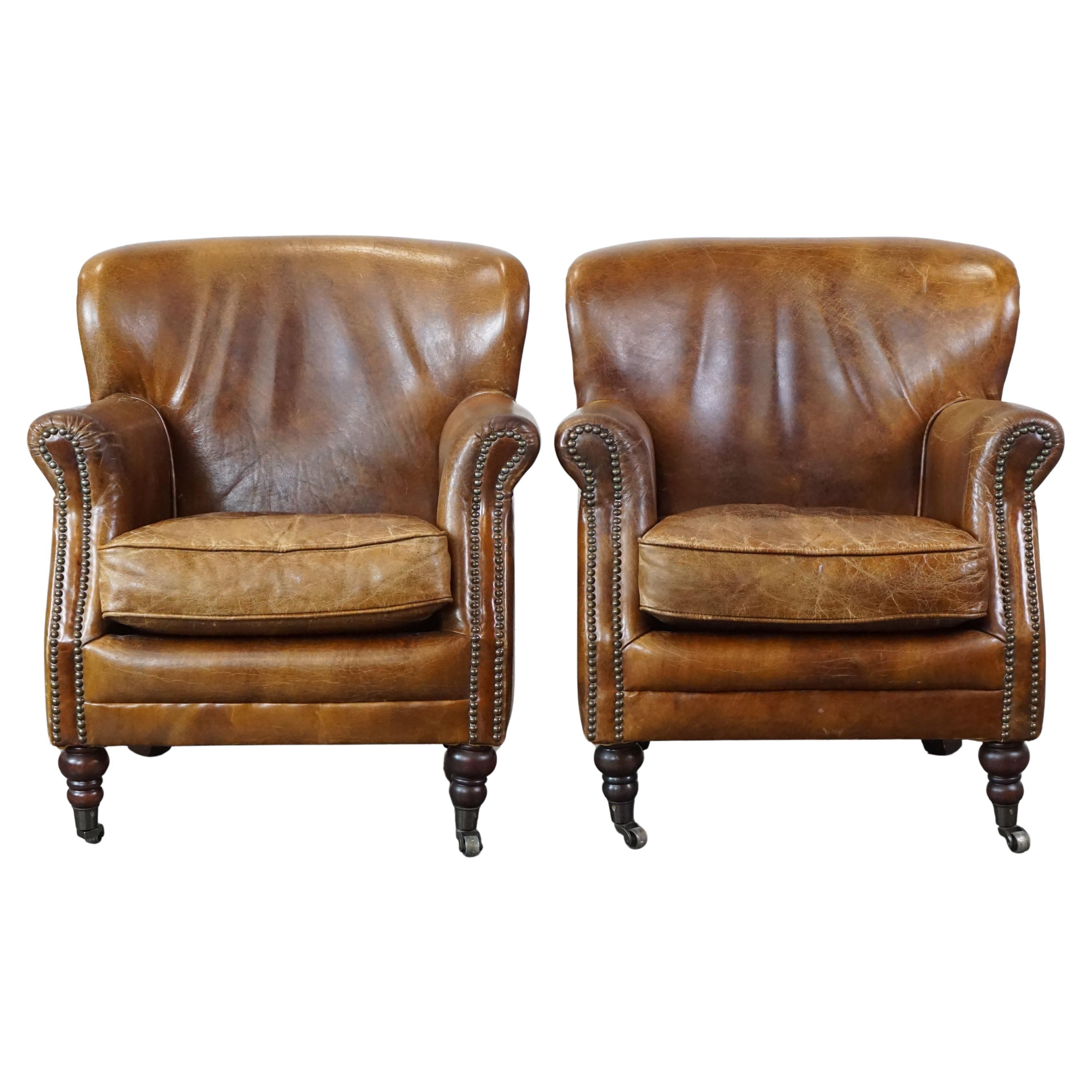 Warm cognac-colored subtle armchair For Sale at 1stDibs