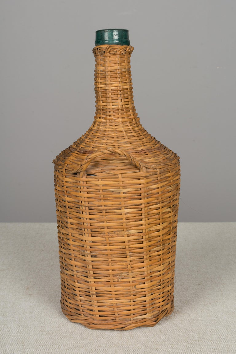 Set of 6 Wicker Wrapped Glass Bottles at 1stDibs