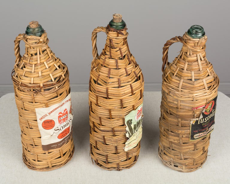 Set of 6 Wicker Wrapped Glass Bottles at 1stDibs