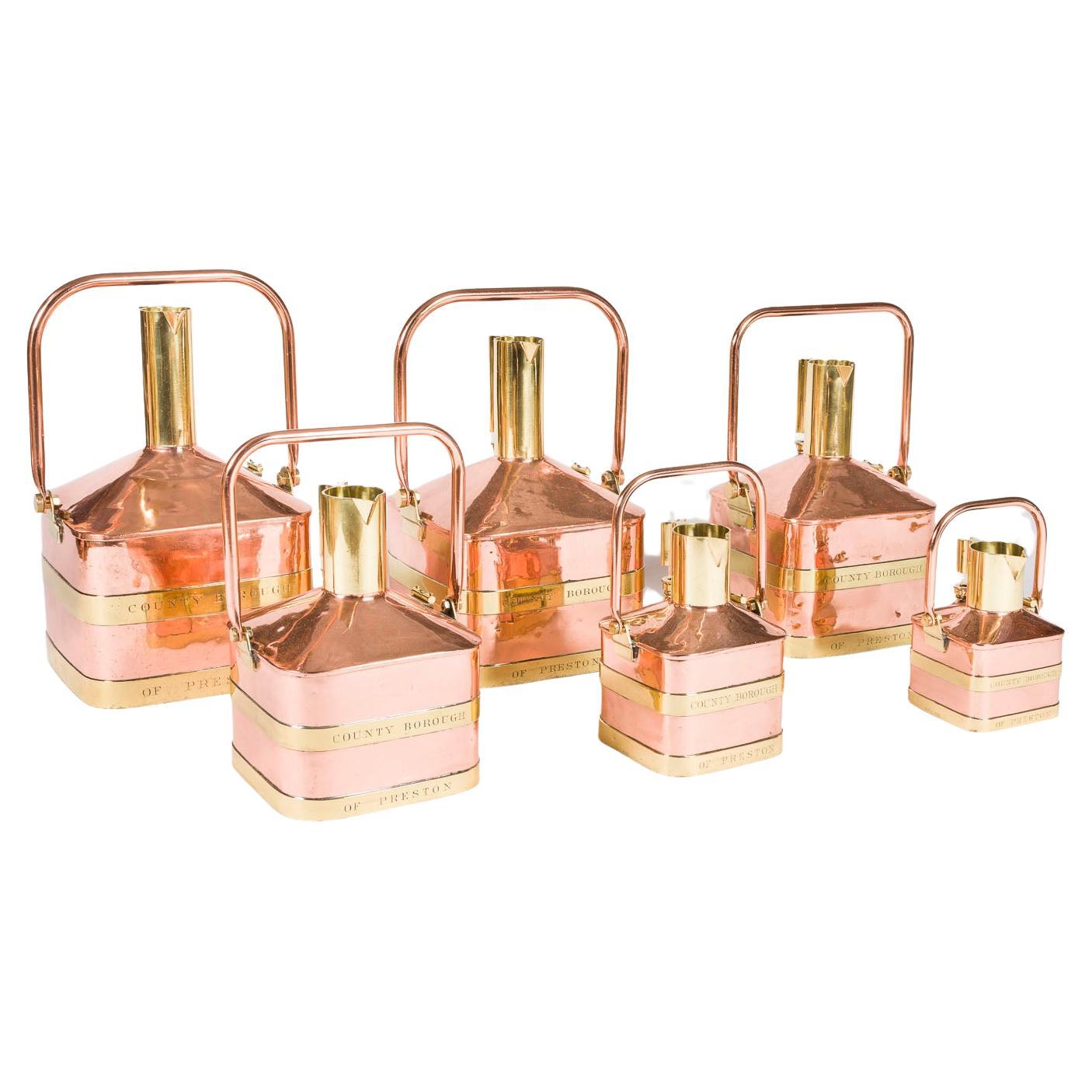 Set of copper imperial volume standard fuel measures by Avery For Sale ...