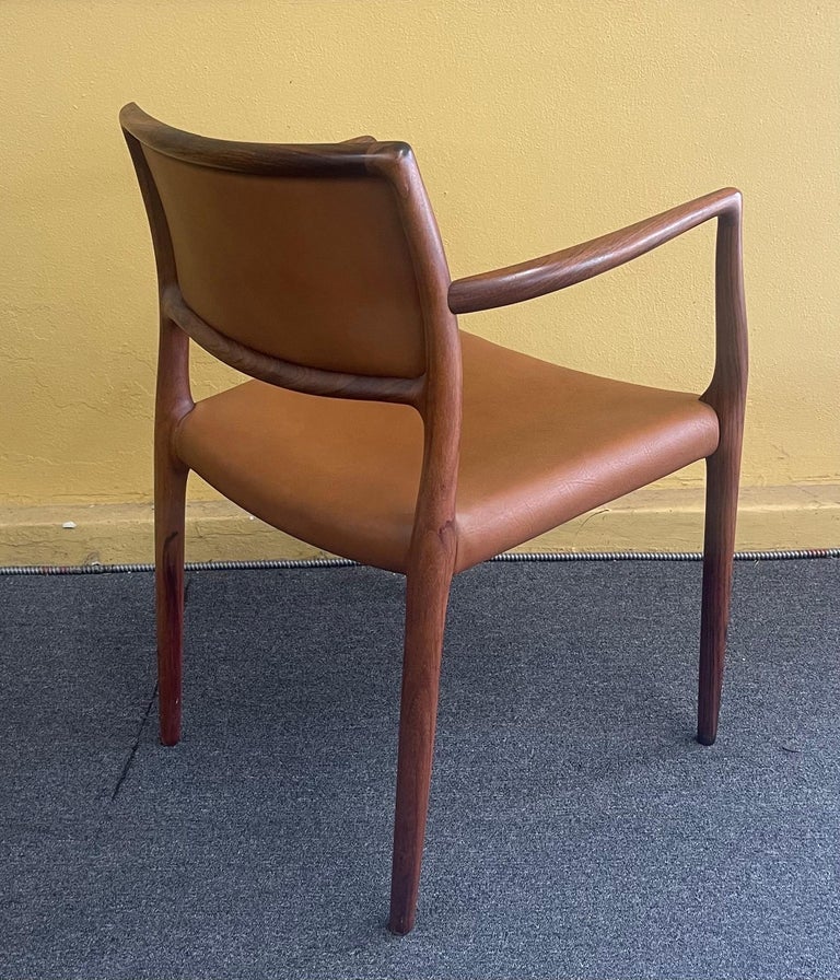Set of Eight Danish Modern Rosewood Model 65 Arm Chairs by Niels Moller ...