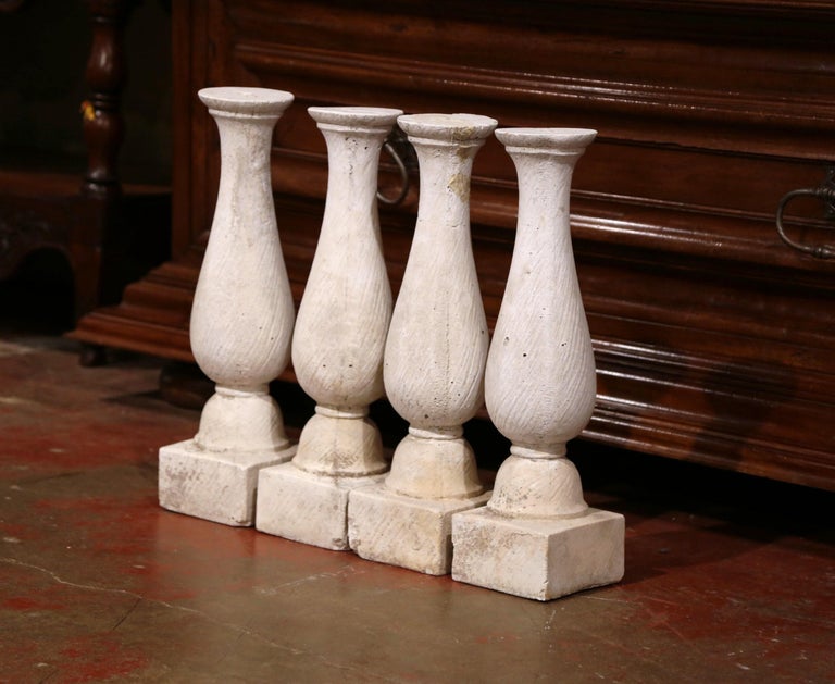 Set of Four French 19th Century Patinated Carved Stone Balusters at 1stDibs