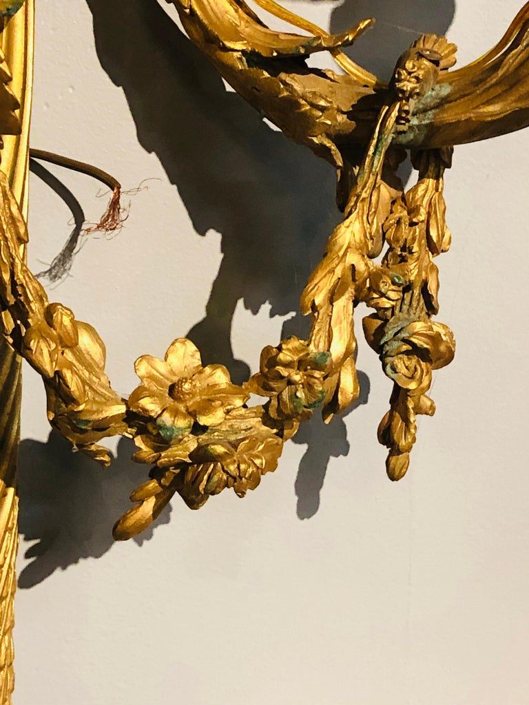 Set of Four Large Ornate Three-Light Torch and Ribbon Form Wall Sconces ...