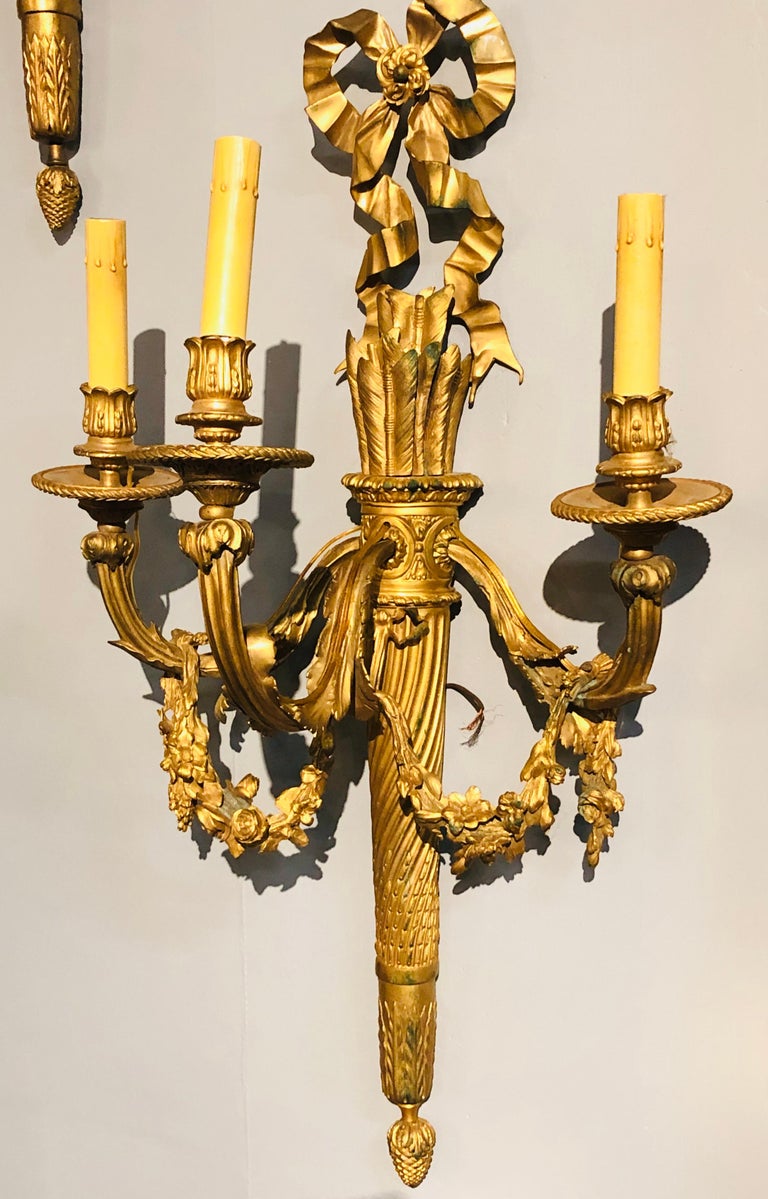 Set of Four Large Ornate Three-Light Torch and Ribbon Form Wall Sconces ...